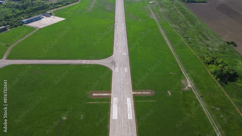 Aerial footage of rural airport runway taxiway and ramp. Airfield ...