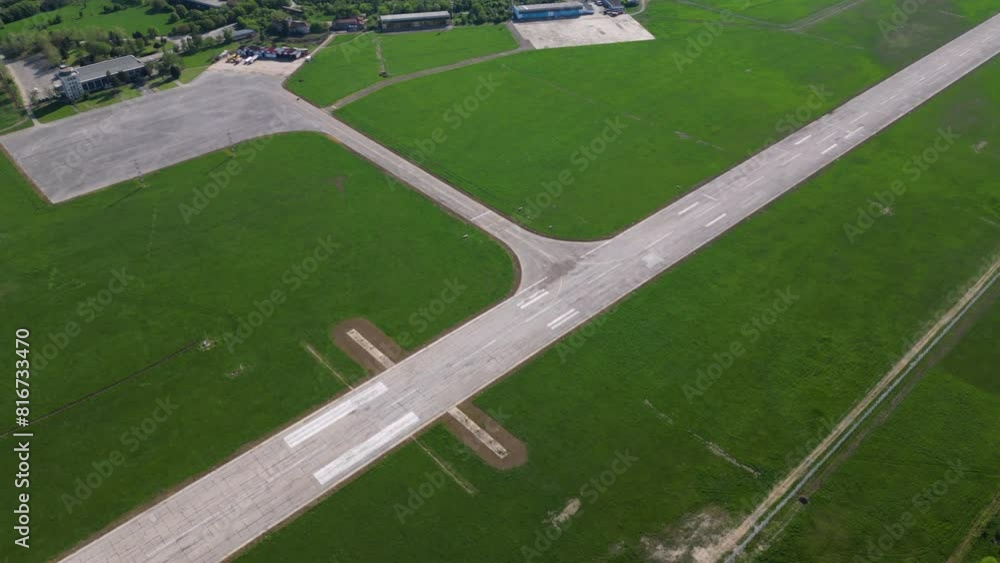 Aerial footage of rural airport runway taxiway and ramp. Airfield ...