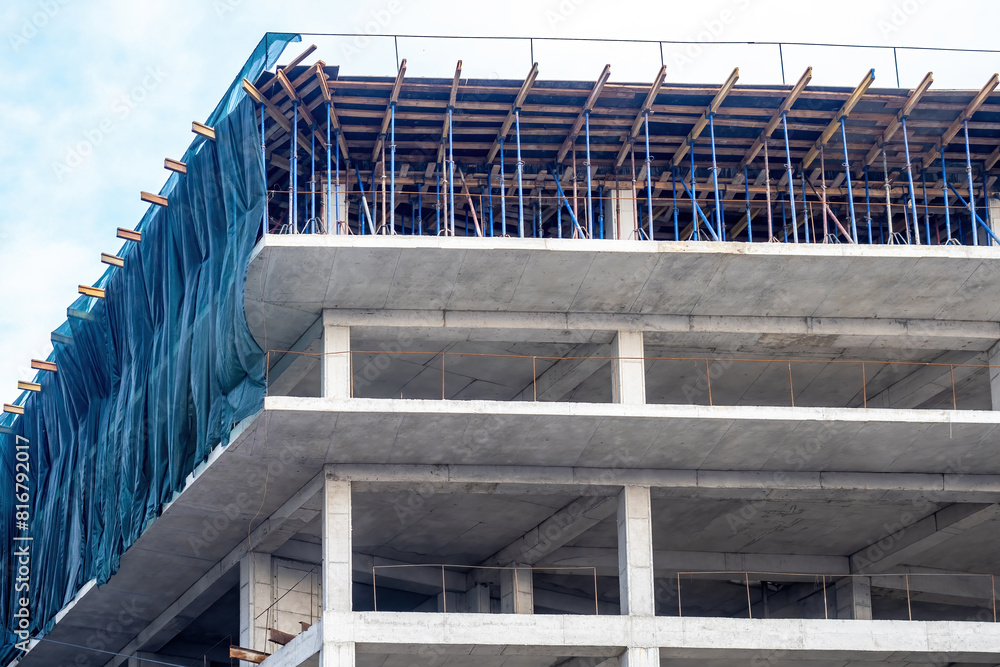 Construction multi-storey building. Erection house made of concrete ...