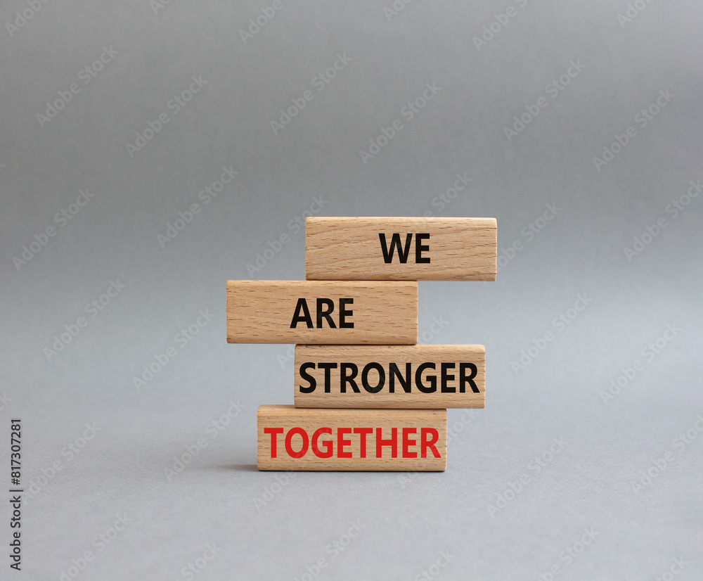 We are stronger together symbol. Wooden blocks with words We are ...