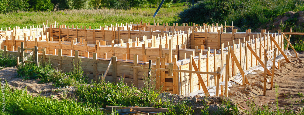 Detailed view of the wooden formwork for the foundation of new house in ...
