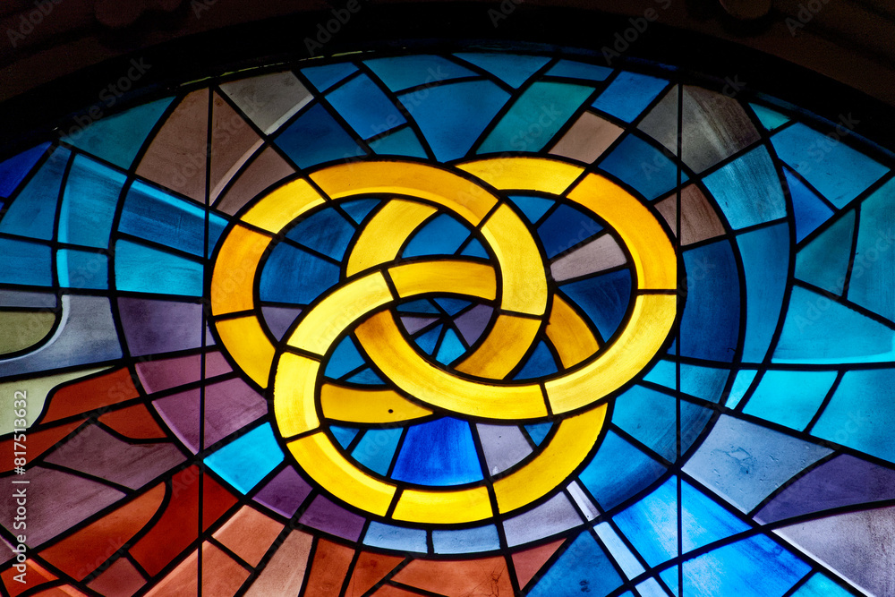 Modern stained glass window symbolically representing the divine ...