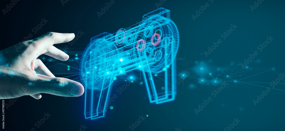 gamer hand holding a gaming joystick controller console with technology ...