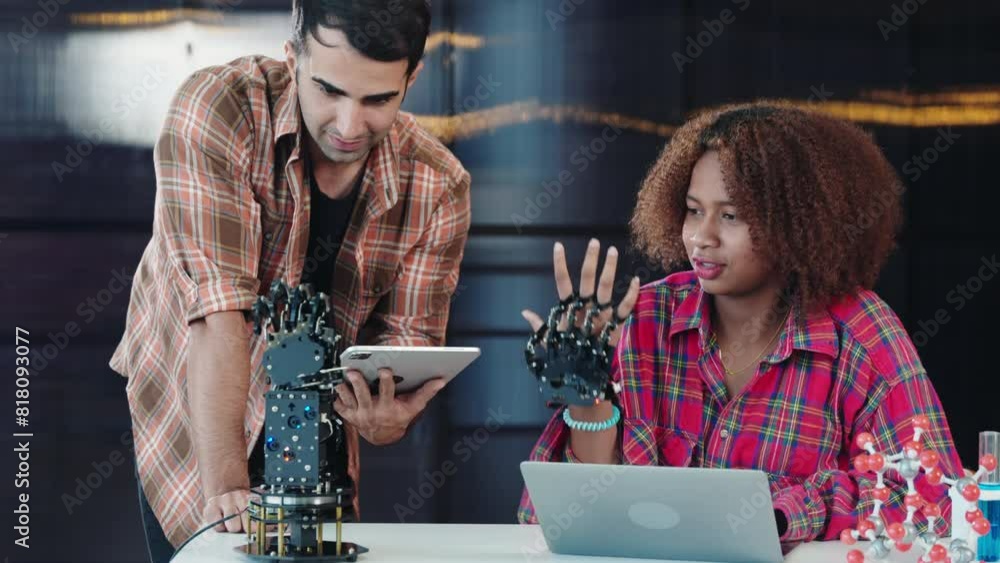 Vídeo do Stock: In a classroom setting teacher aids a student crafting ...