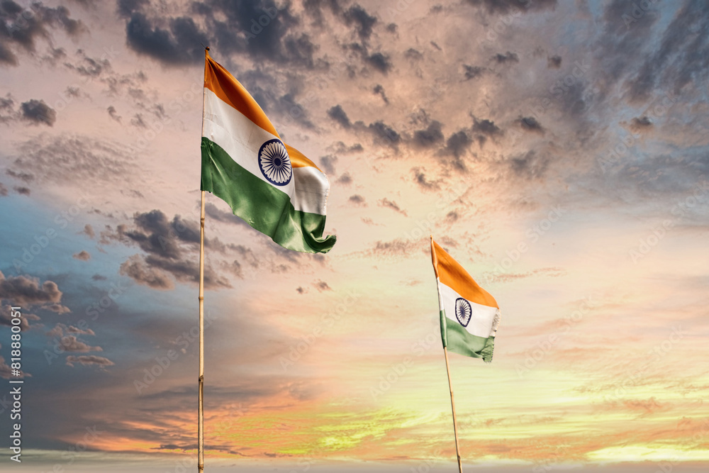two Indian tri color with saffron green white and ashoka chakra waving ...