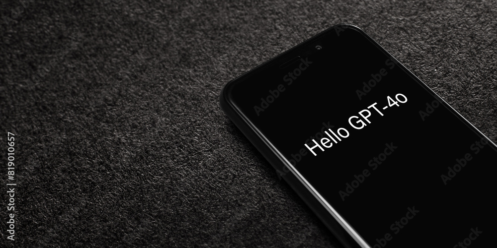 GPT-4o logo on screen smartphone on black textured background ...