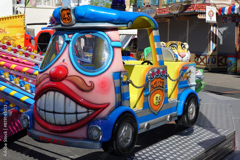 Nordhorn, Germany - May 12 2024 A funny policecar for small children in ...