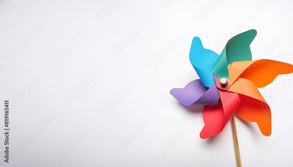 pinwheel or windmill paper origami isolated on white background simple ...