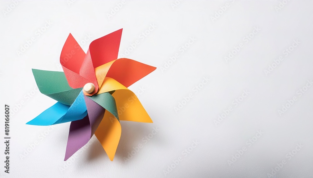 pinwheel or windmill paper origami isolated on white background simple ...