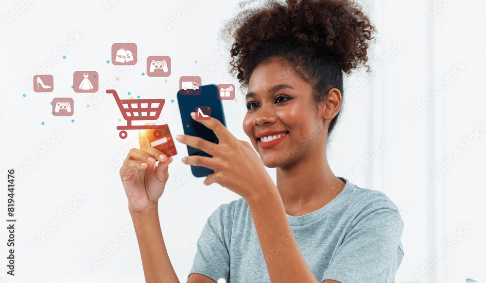 Elegant customer wearing gray shirt controlling device choosing online ...