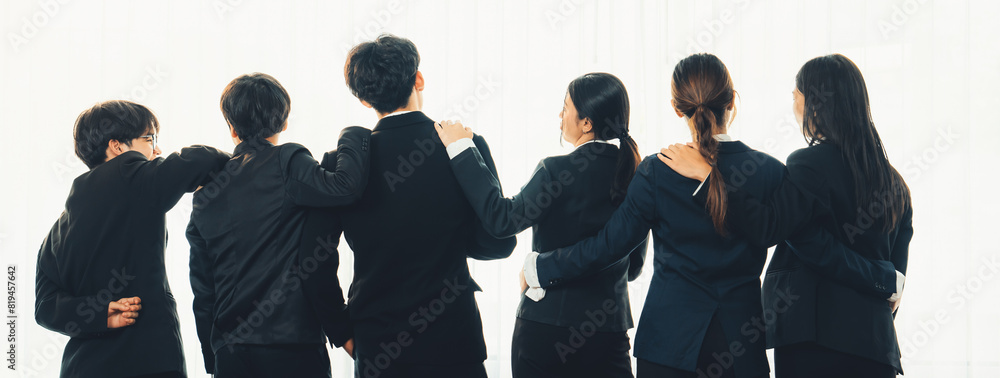 Panoramic banner back view of office worker team standing in line ...