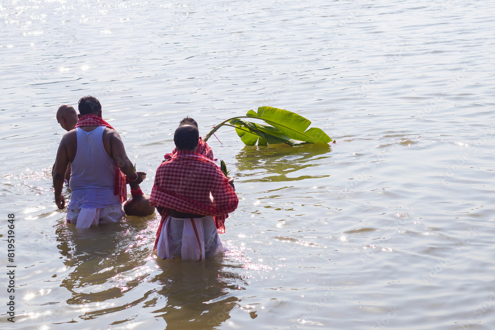 Durga puja ritual of kolabou snan is done by bathing a banana tree in ...