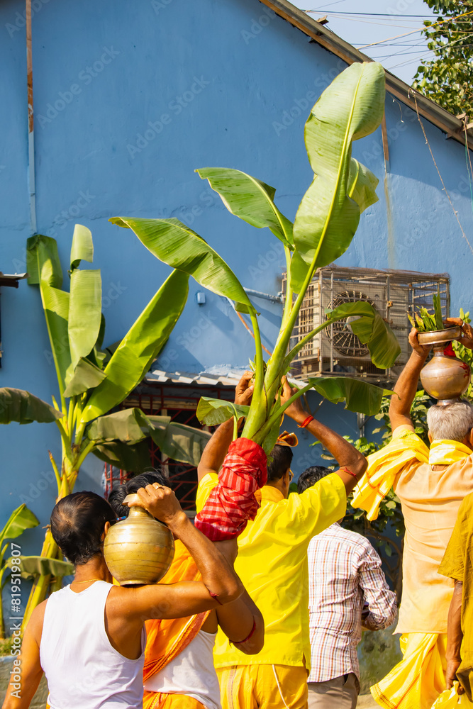 Durga puja ritual of kolabou snan is done by bathing a banana tree in ...