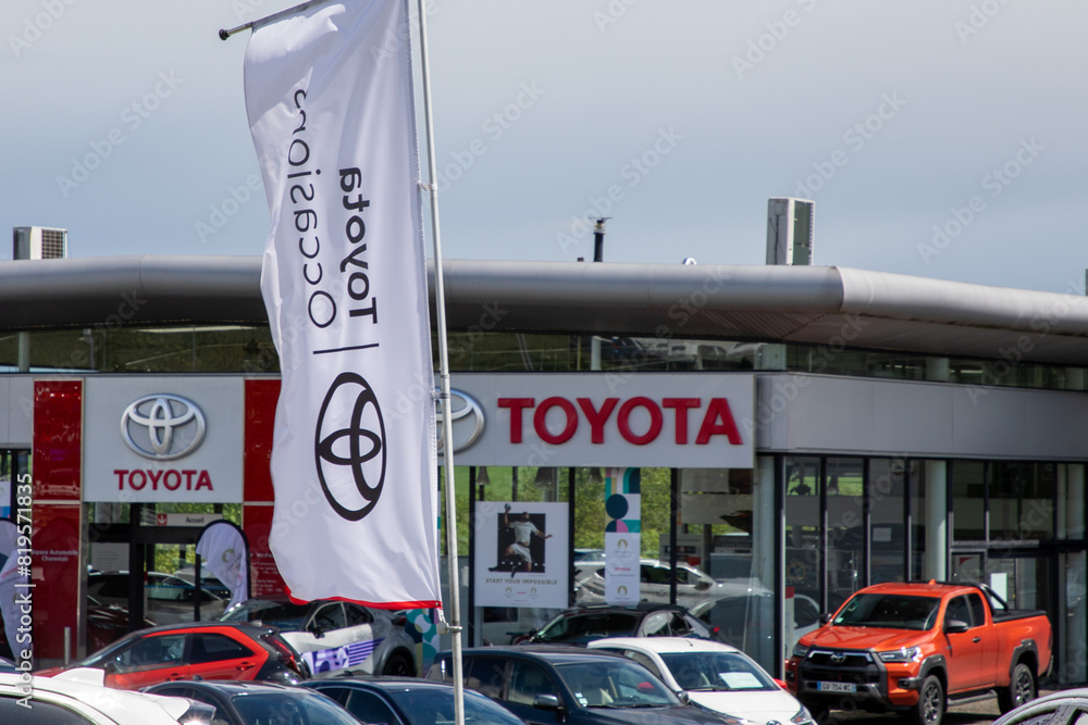 Toyota logo brand facade and text sign entrance of Automobile ...