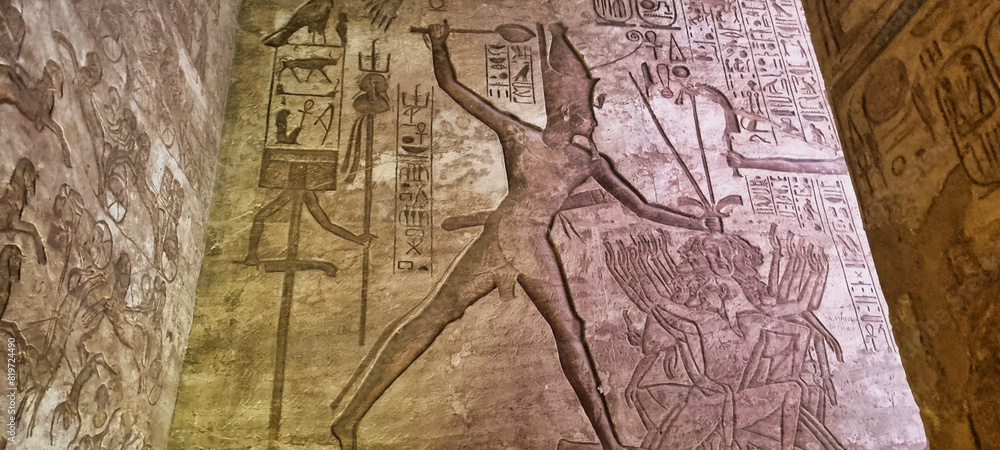 Ancient Egyptian sculpture featuring a feline companion Stock Photo ...