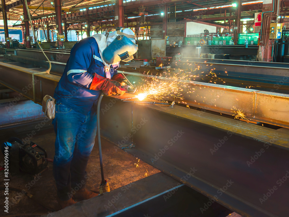 Welder is Gouging Back Weld adds Joint Steel H-Beam with Air Carbon Arc ...