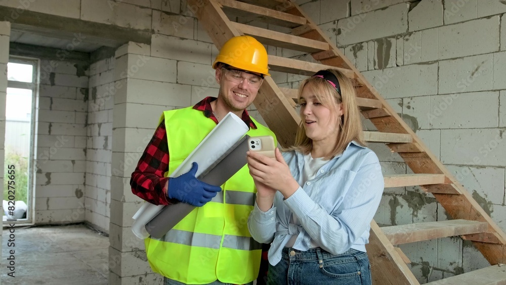Team of building professionals inspecting together dwellings under ...