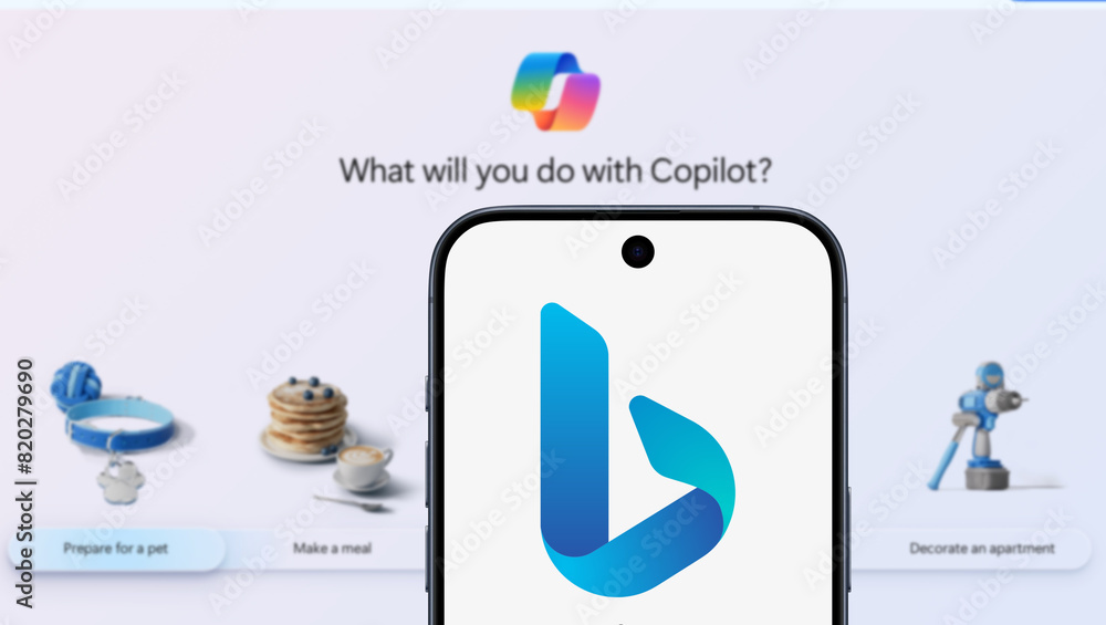 Bing logo is displayed on a modern smartphone, website in the ...