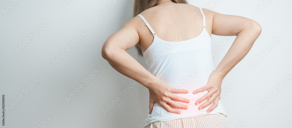 woman having back body ache during at home. adult female with muscle ...