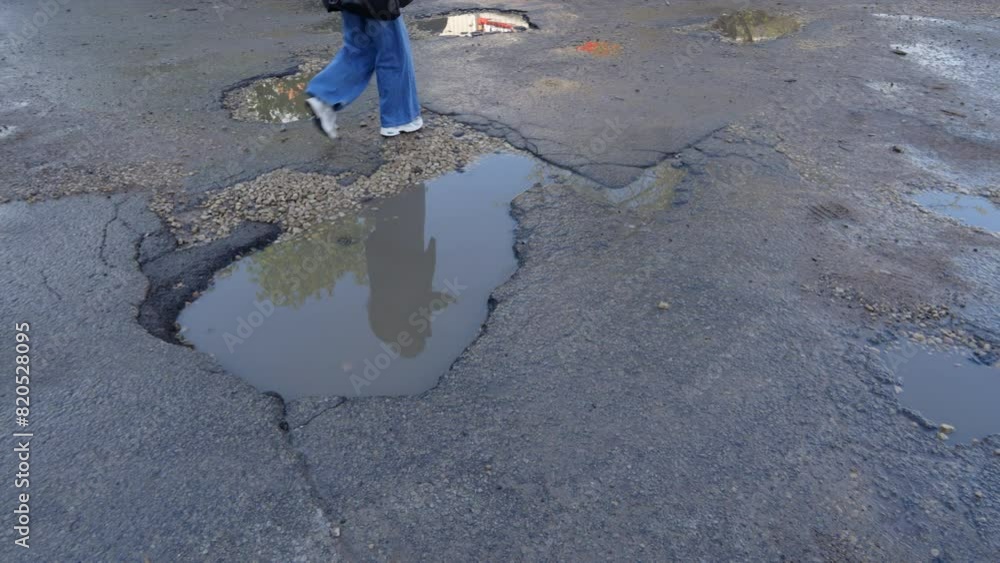 Government failing to fix broken city street holes, people walking ...