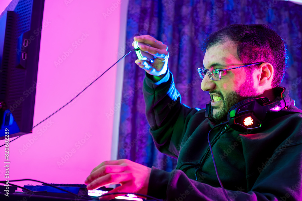 Streamer Angry computer gamer man yells and breaks keyboard after being ...