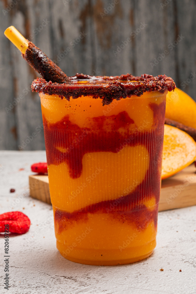 Mangonada, typical mexican mango smoothie with chamoy sauce and lime ...