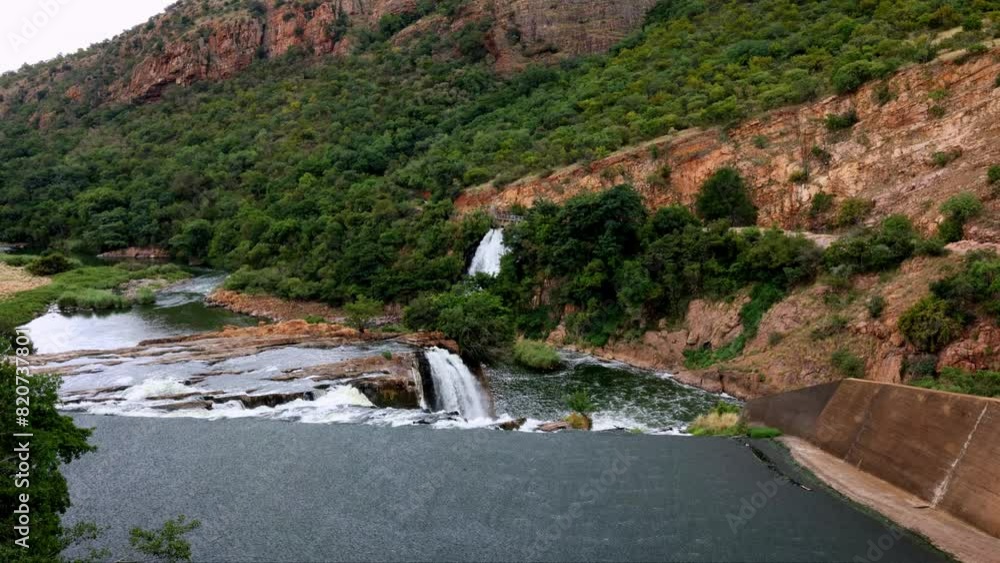 View from the dam wall, looking out over the sluice at Hartbeespoort ...
