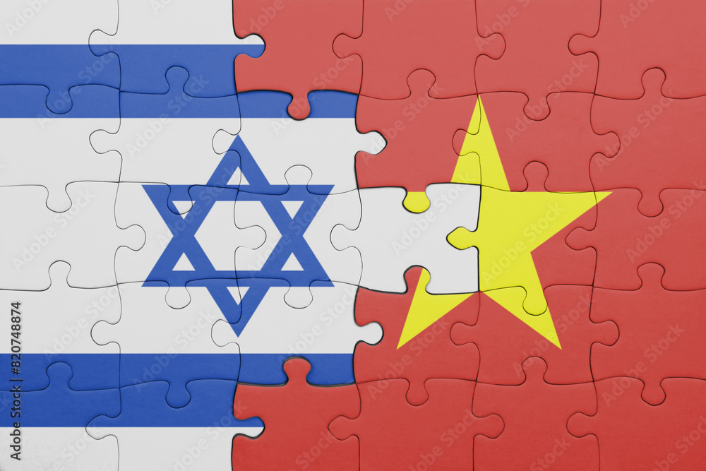 puzzle with the colourful national flag of israel and flag of vietnam ...