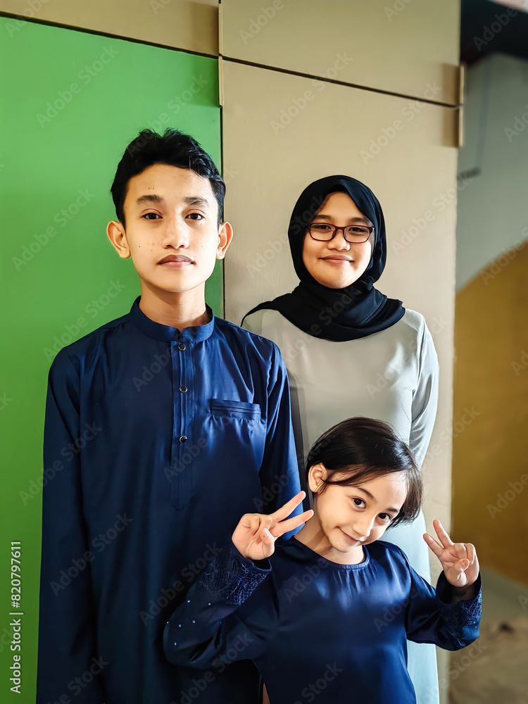 Family and Siblings concept celebrating eid fitr. Asian Malay Muslim ...