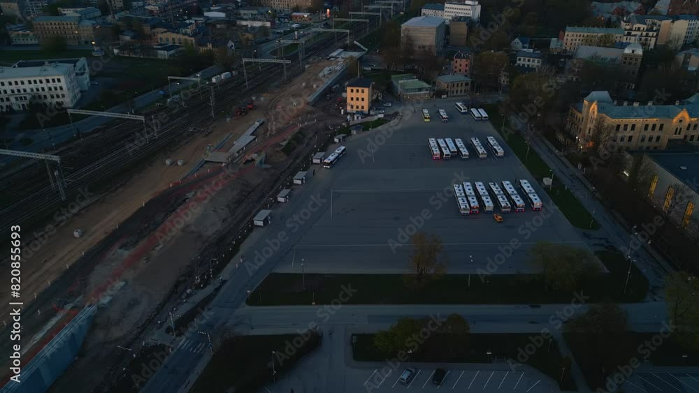 An aerial view shows urban construction, a bus depot, and citys ...