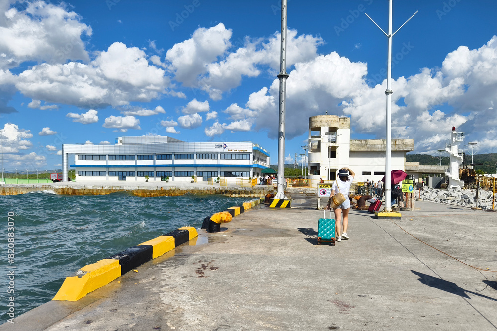 Tubigon, Bohol, Philippines - Passengers arrive at the terminal ...