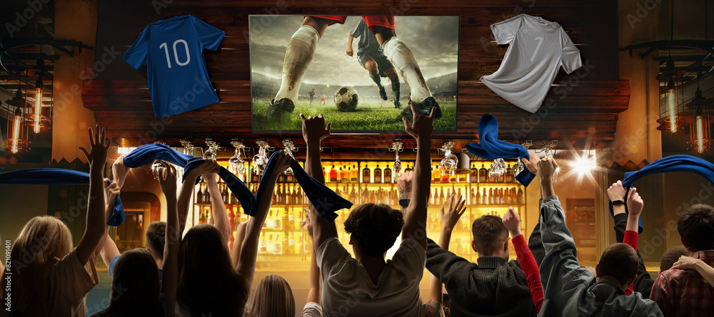 Victory Celebration. Soccer enthusiasts gather in pub to watch live ...
