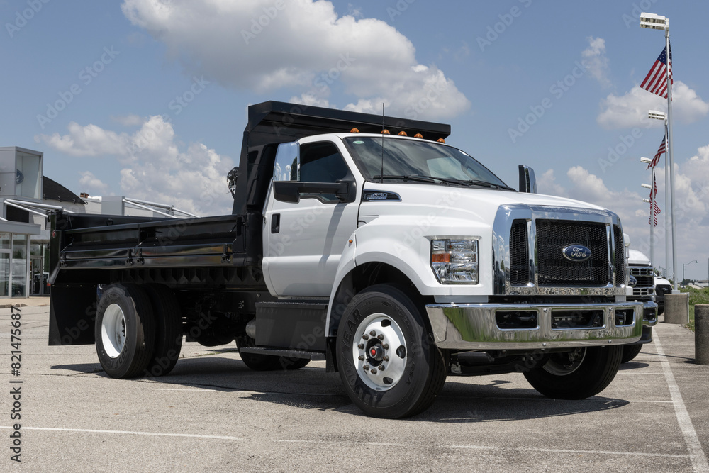 Ford F-650 DRW Dump Body display at a dealership. Ford offers the F650 ...