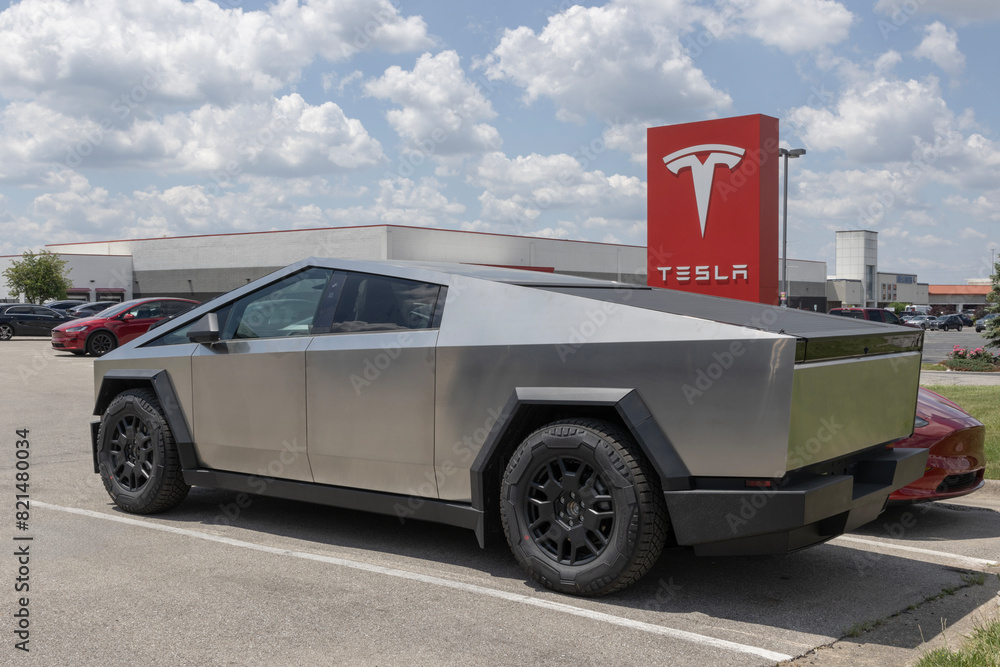 Tesla Cybertruck display at a dealership. Tesla claims the Cybertruck ...