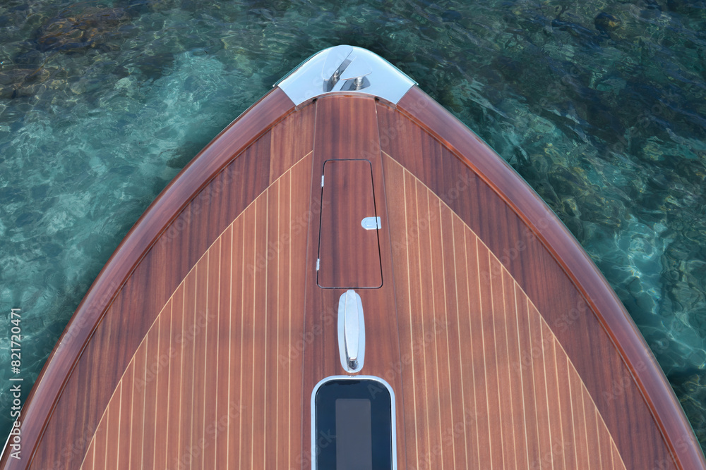 Front part of a wooden Luxury boat top view against a background of ...