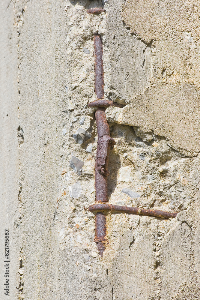 Old and damaged reinforced concrete pillar with poor and damaged ...