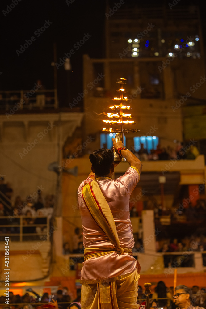Fotografering, Billede Ganga aarti, Portrait of young priest performing ...