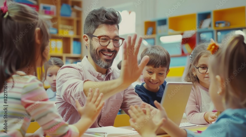 In an elementary school computer science class, the teacher uses a ...