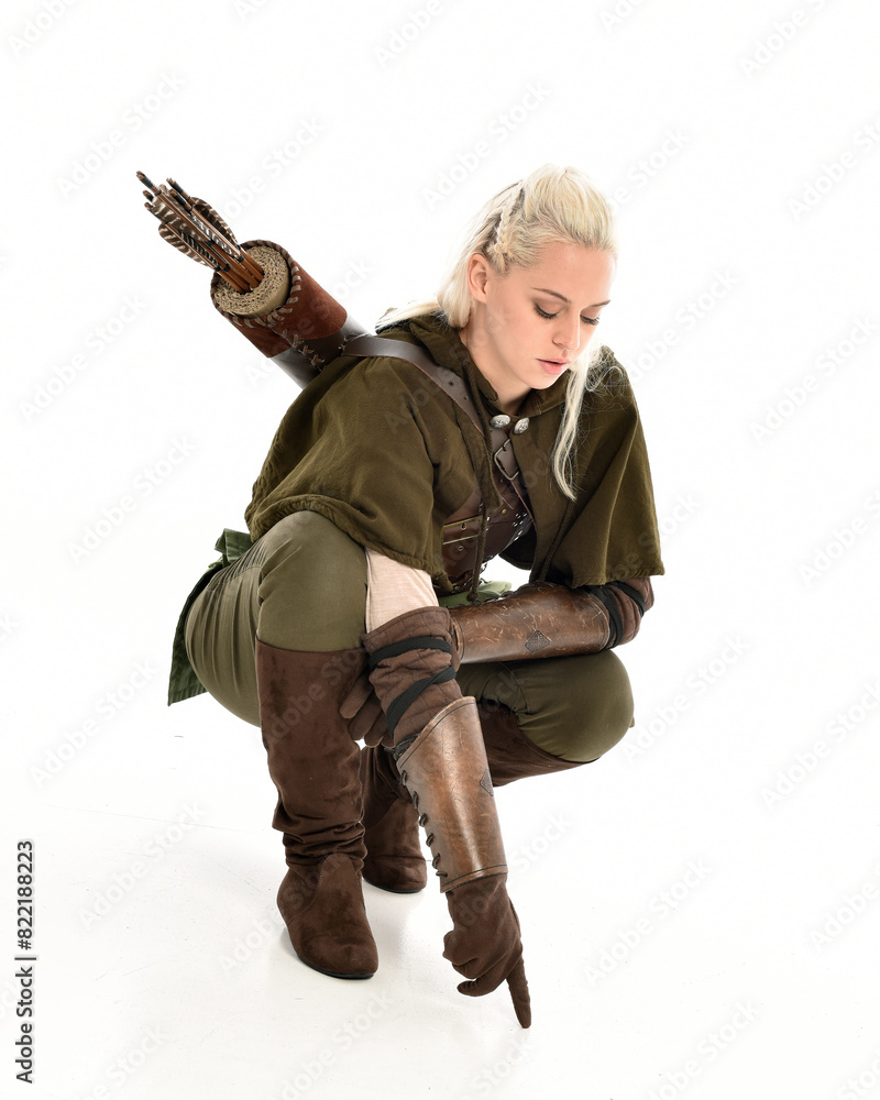 full length portrait of blonde female model wearing green fantasy elf ...