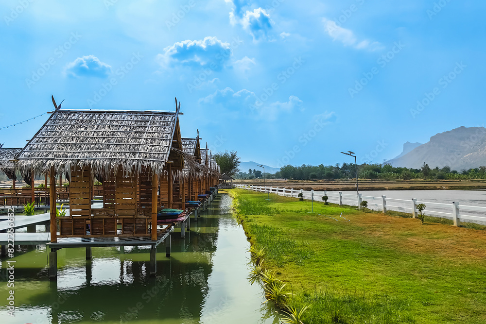 Traditional bamboo hut with thatched roof for relaxing with landscape ...