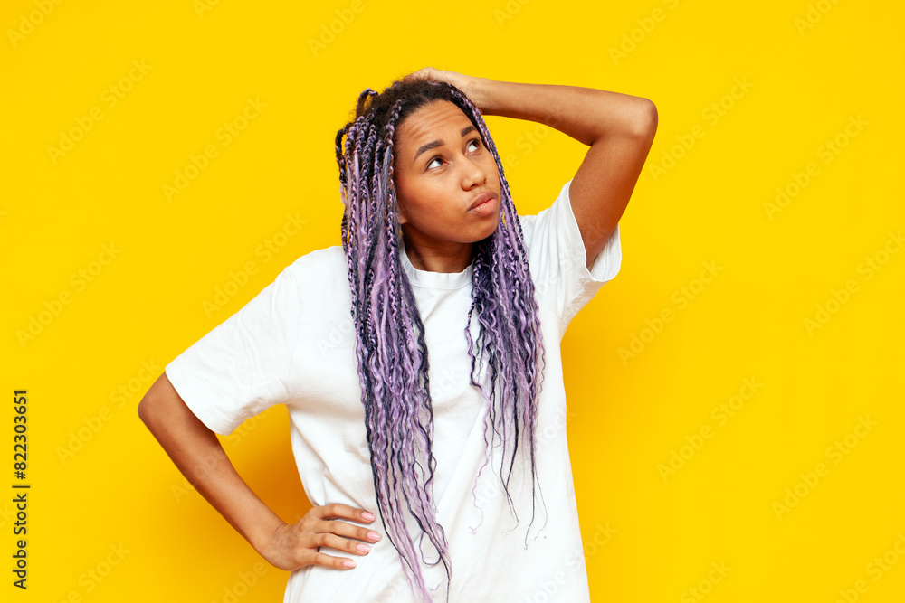 puzzled african american woman remembers forgets and scratches her head ...
