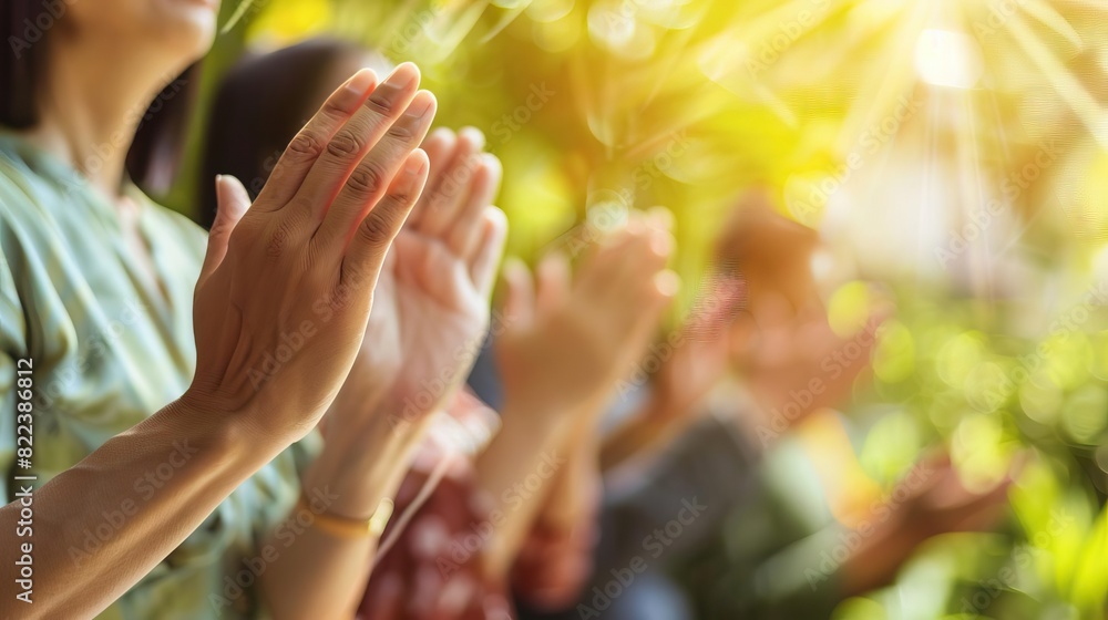 Group of people clapping, focus on hands, with a bright background ...
