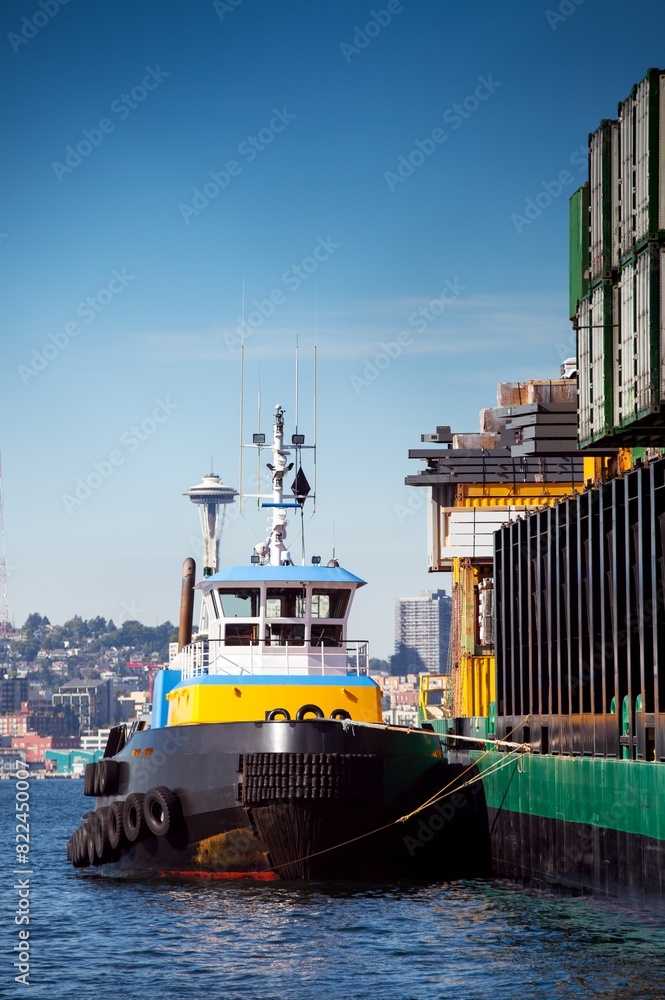 4K Ultra HD Image: Tug Boat Maneuvering Cargo Ship at Dockside in Port ...