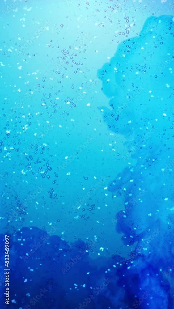 Vertical Underwater Blue Explosion Burst 4K features an underwater view ...