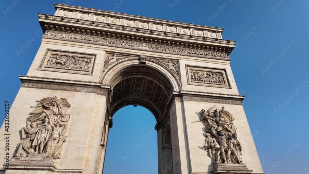 The Arc de Triomphe in Paris, captured at dawn from various angles ...