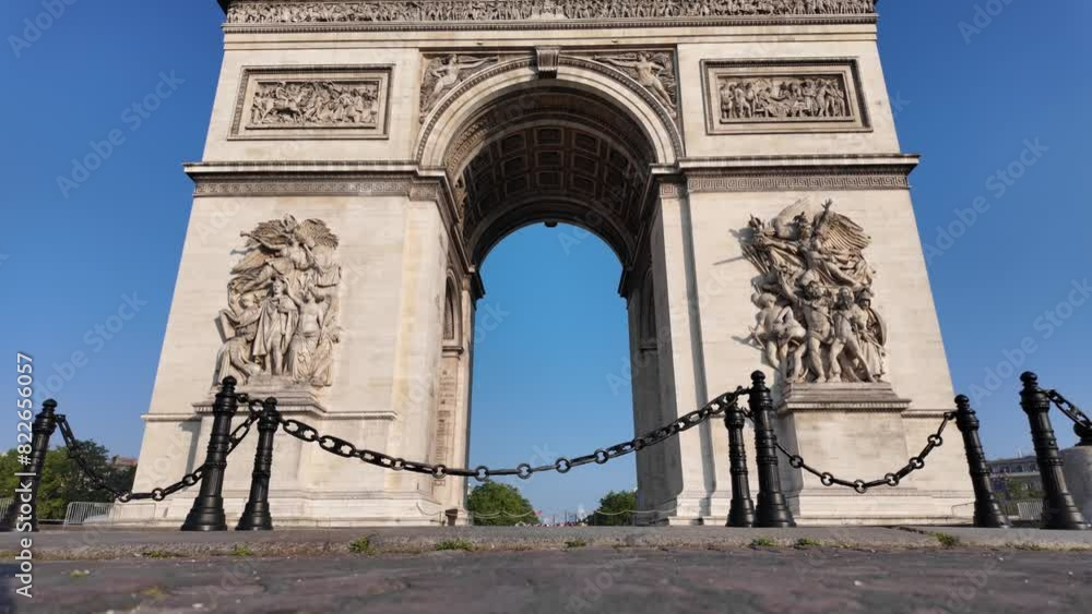 The Arc de Triomphe in Paris, captured at dawn from various angles ...