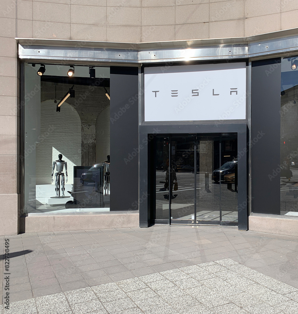 Stockholm, Sweden; Tesla car dealership with showcase showing humanoid ...