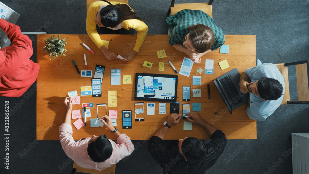 Top view of skilled developer team stick idea about Ux Ui design for ...