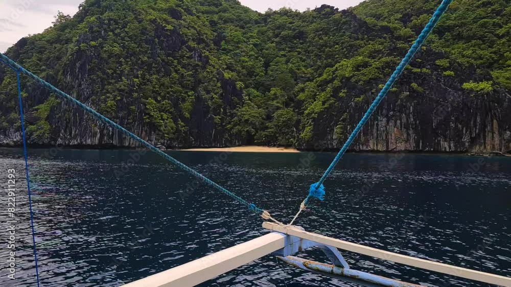 Filipino Bangka Catamaran Boat Sailing by Hidden Beach Under Limestone ...