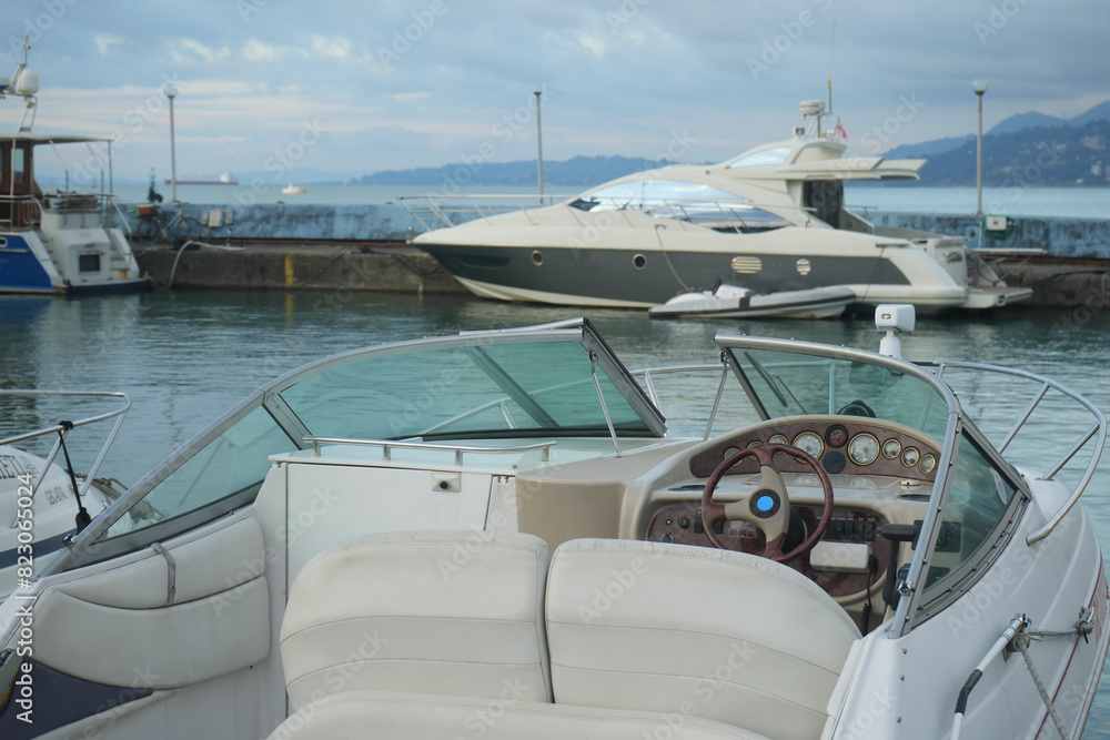 Instrument panel and steering wheel of a motor boat cockpit, yacht ...